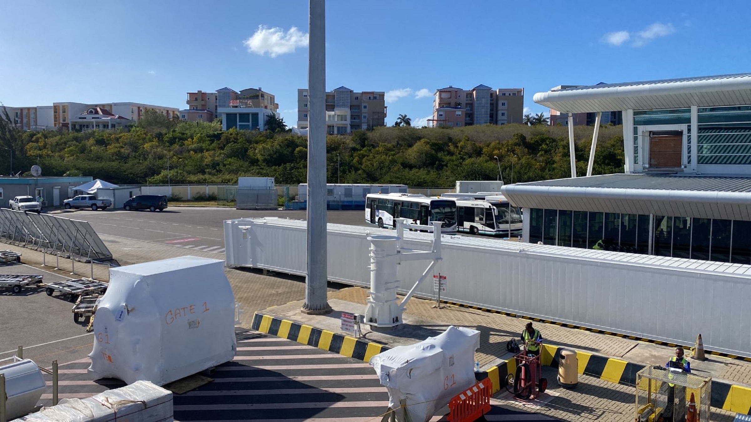 Jetbridge being installed at Princess Juliana International Airport ...